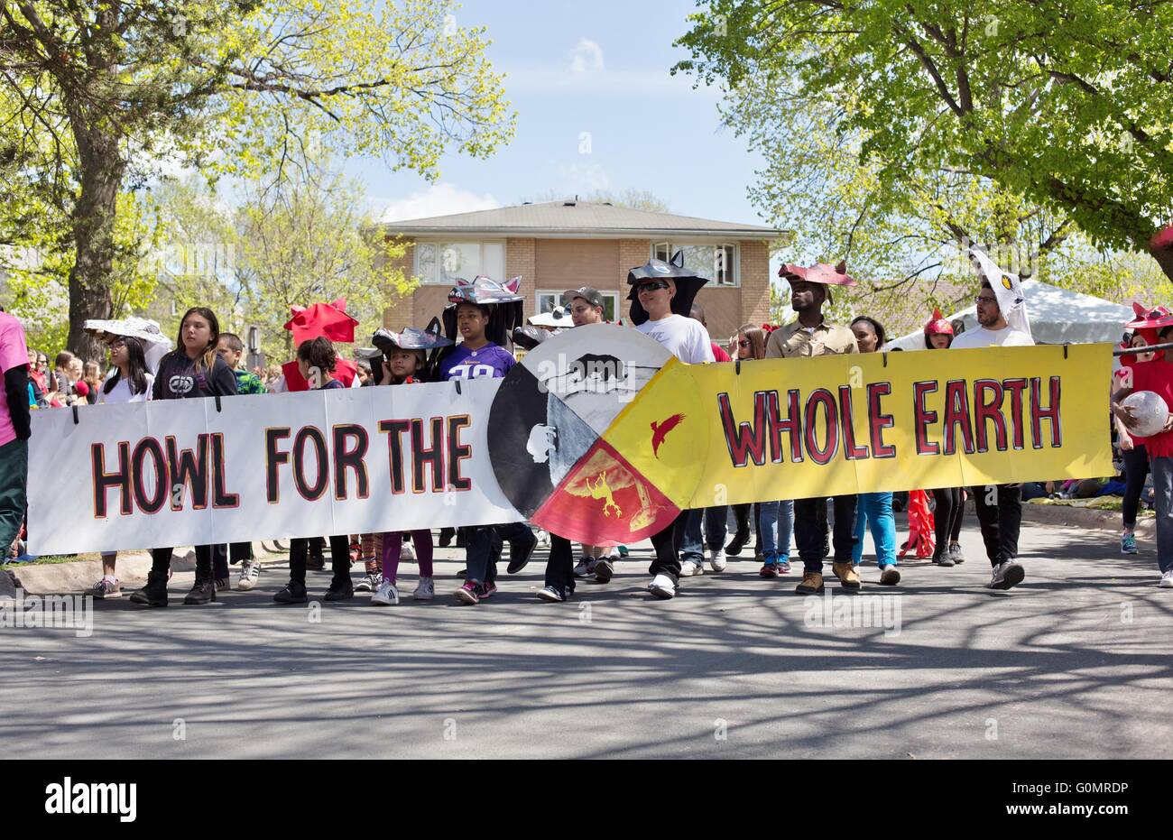 People holding a banner at the May Day celebration including parade and ...