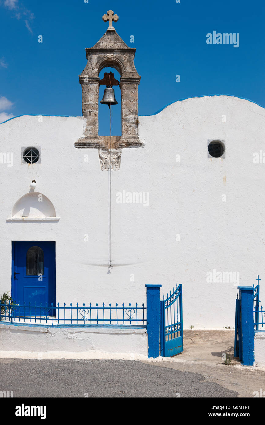 Greek white church in Komitades. Crete. Greece. Vertical Stock Photo ...