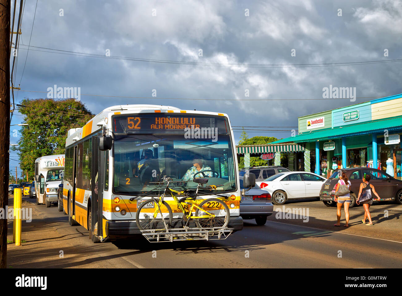 A public bus with a bike on the front in Hawaii Stock Photo - Alamy