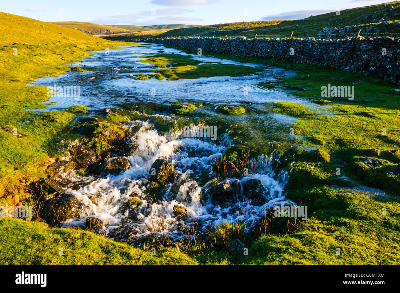 Stream disappears underground at Water Sinks near Malham Tarn on the ...