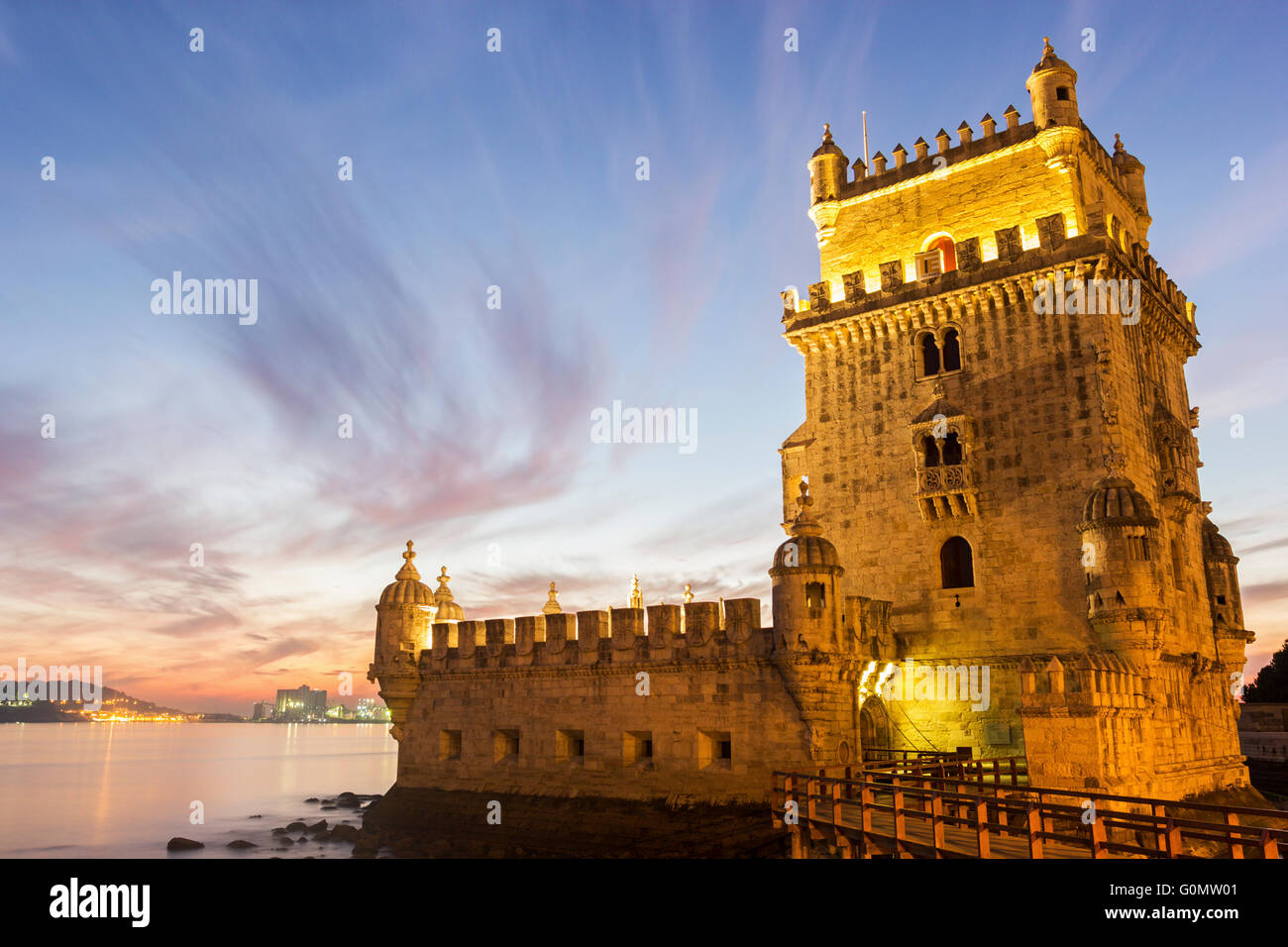 The iconic facade of the Tower of Belem on the bank of the Tagus River ...