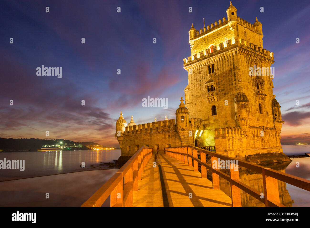 The iconic facade of the Tower of Belem on the bank of the Tagus River ...