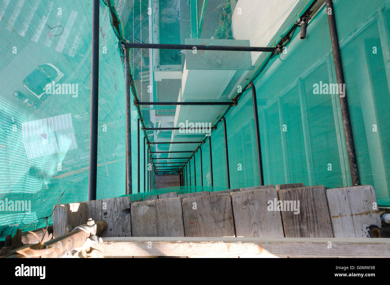 loader tower in scaffolding for a renovated roof Stock Photo - Alamy