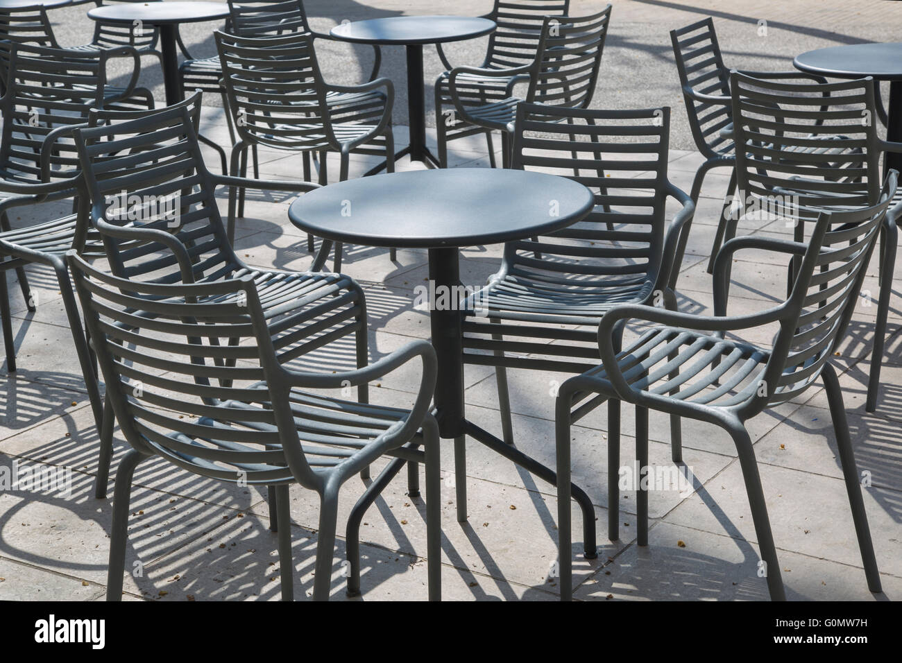 Cafe Restaurant Tables and Chairs on Street Stock Photo - Alamy
