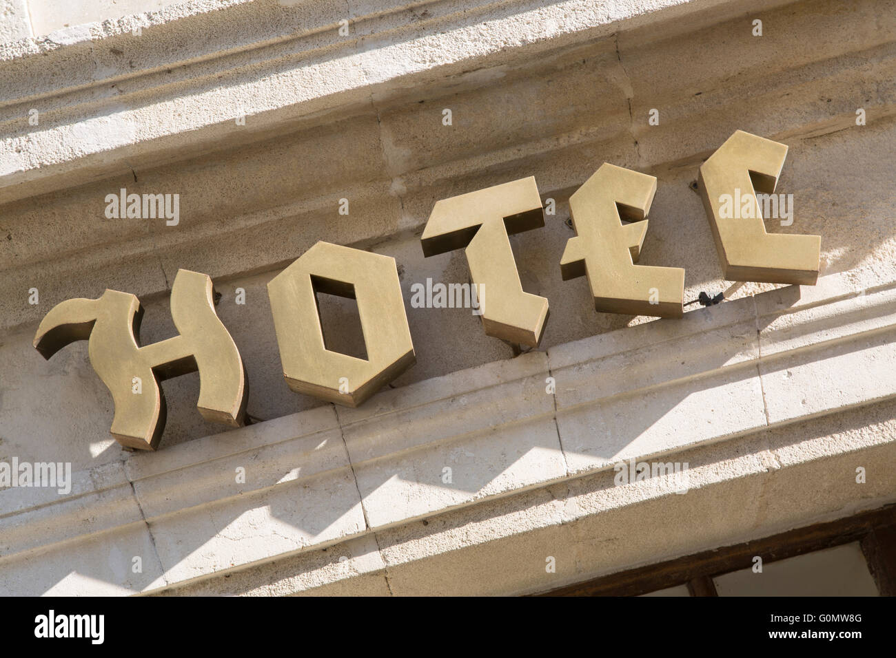 Hotel Sign on Building Facade Stock Photo - Alamy