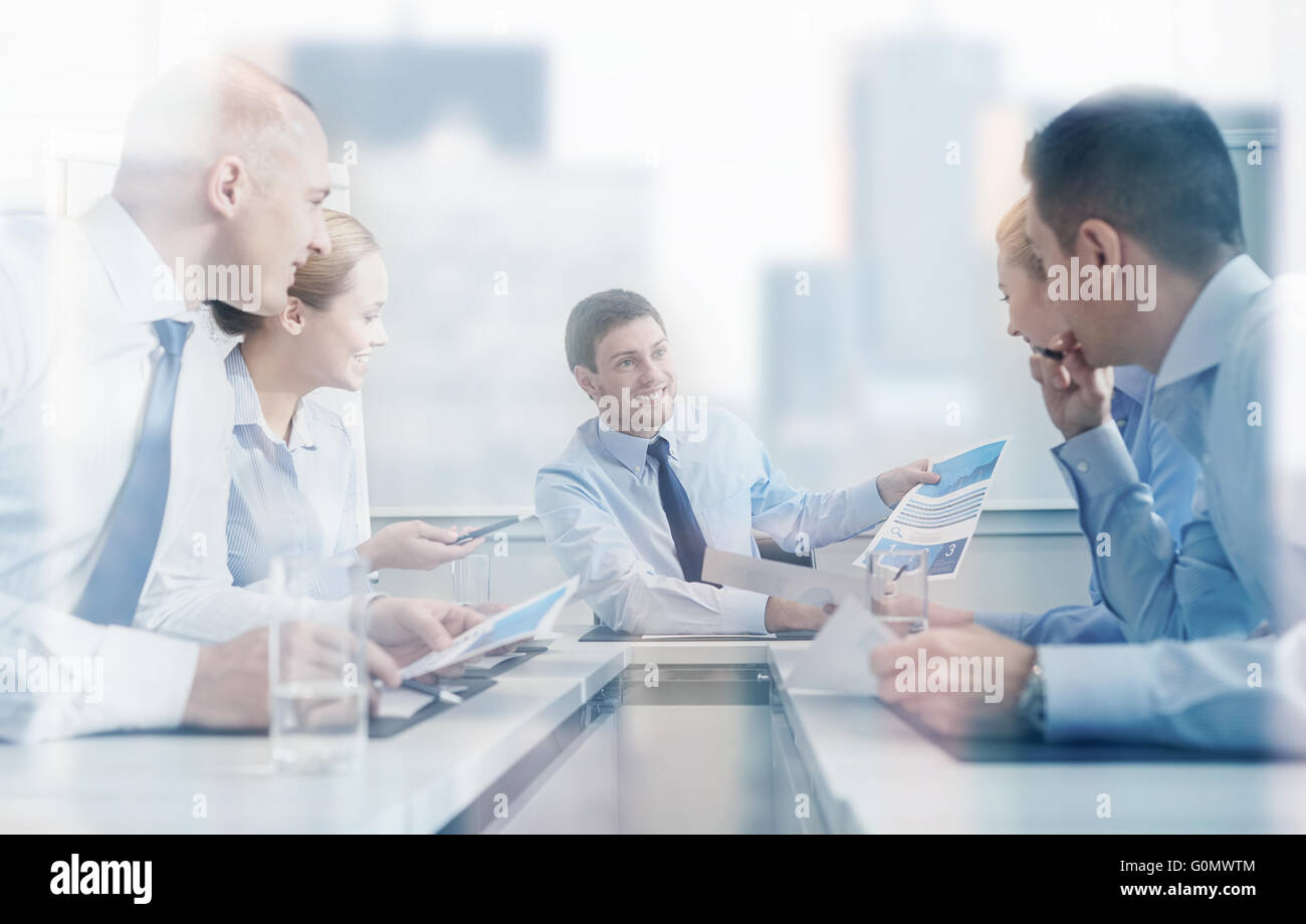 group of smiling businesspeople meeting in office Stock Photo - Alamy