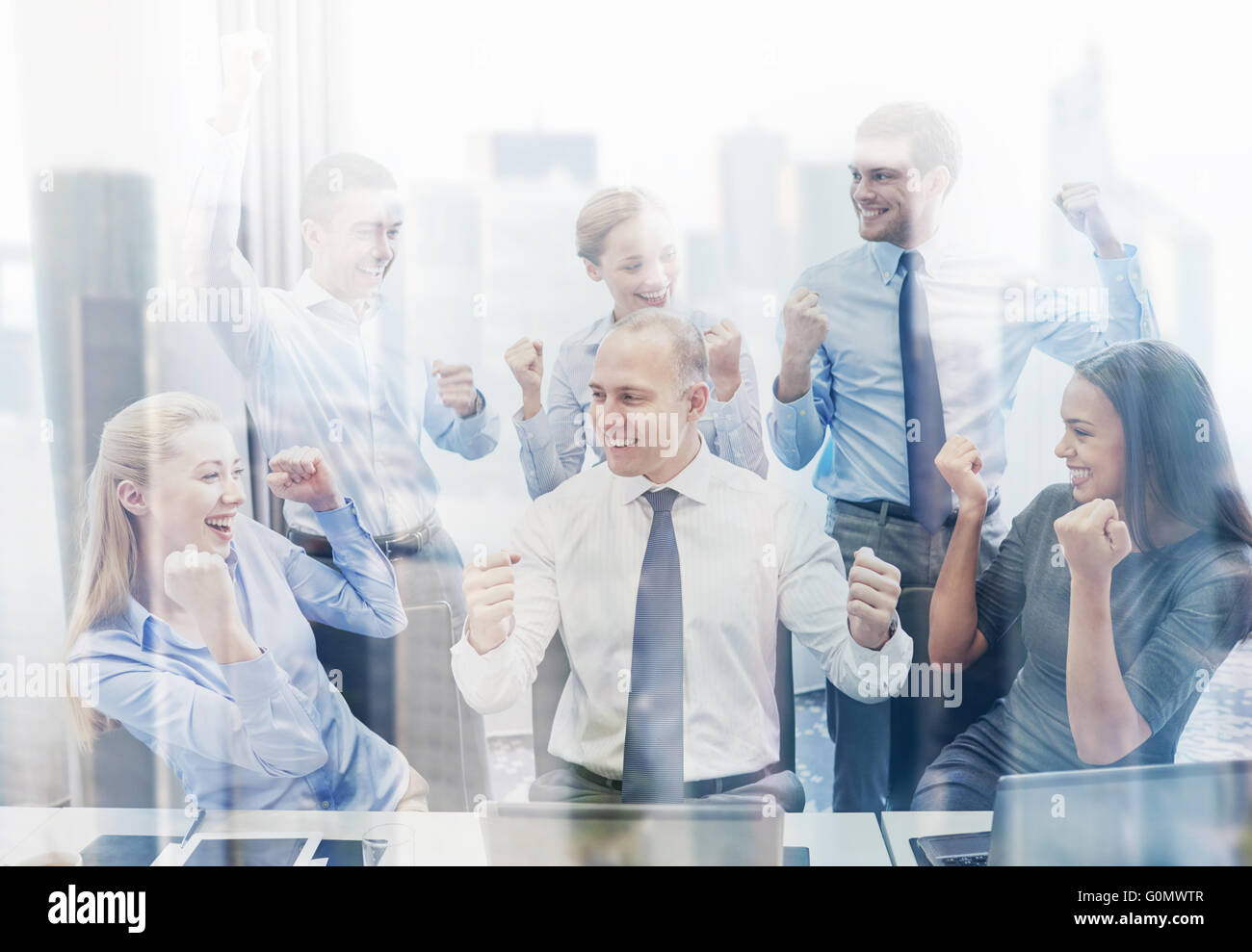 business people celebrating victory in office Stock Photo - Alamy