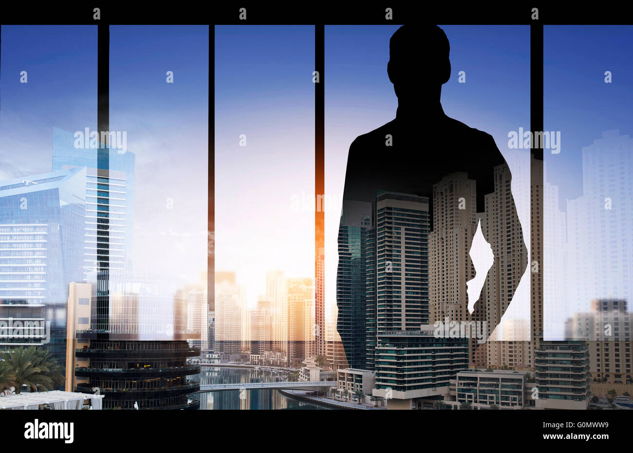 silhouette of business man over city background Stock Photo - Alamy