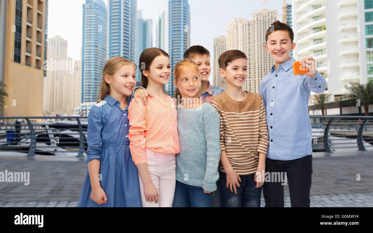 happy children talking selfie by smartphone Stock Photo - Alamy