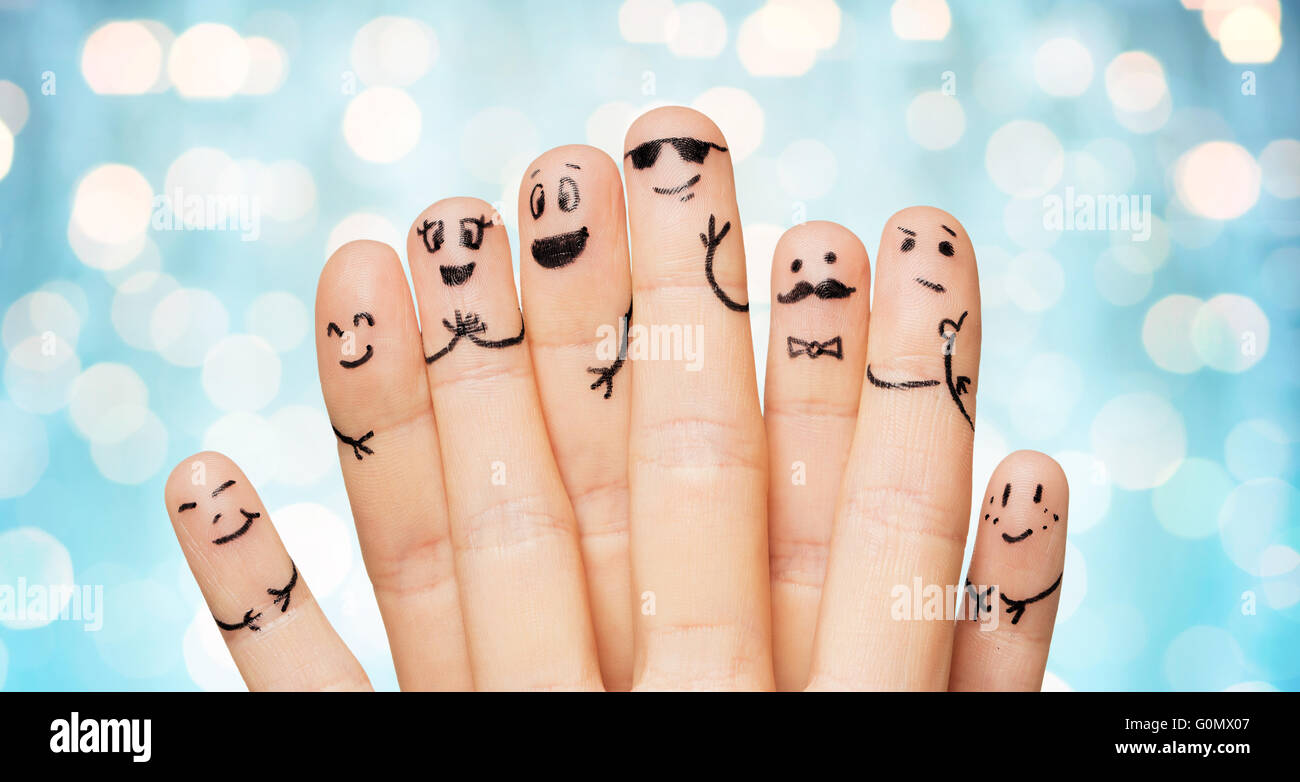 close up of hands and fingers with smiley faces Stock Photo - Alamy