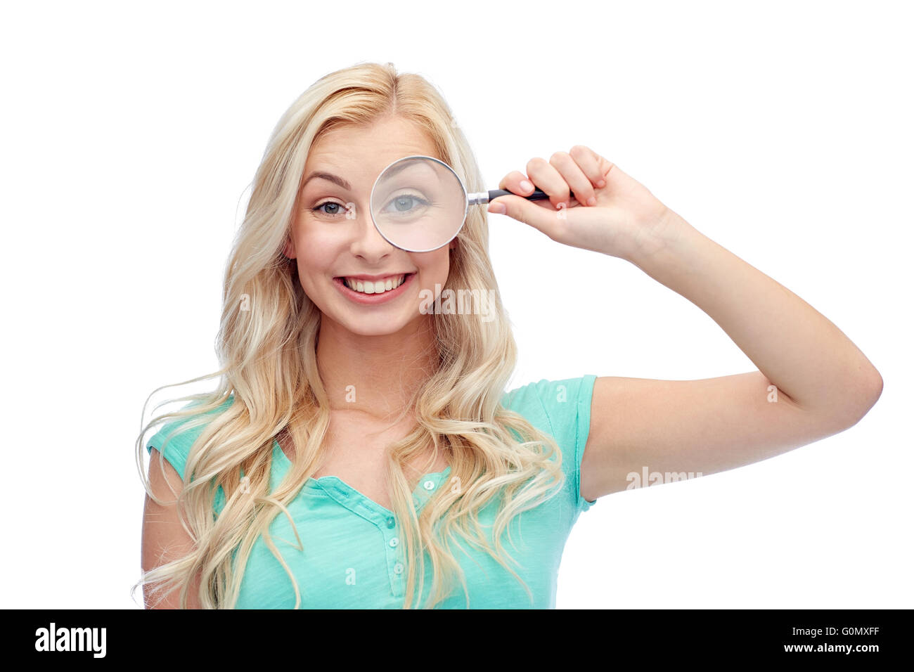 happy young woman with magnifying glass Stock Photo - Alamy