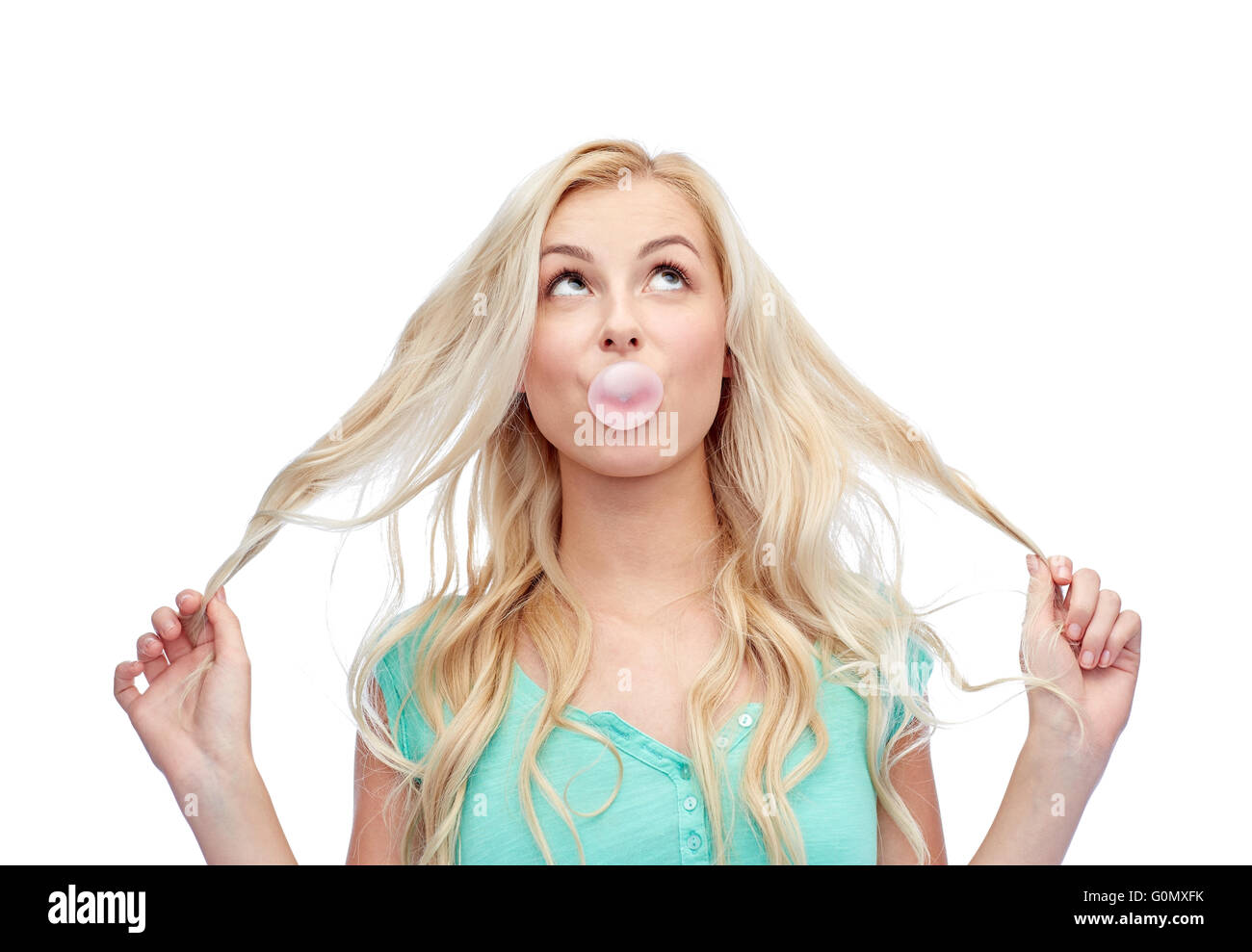 happy young woman or teenage girl chewing gum Stock Photo - Alamy