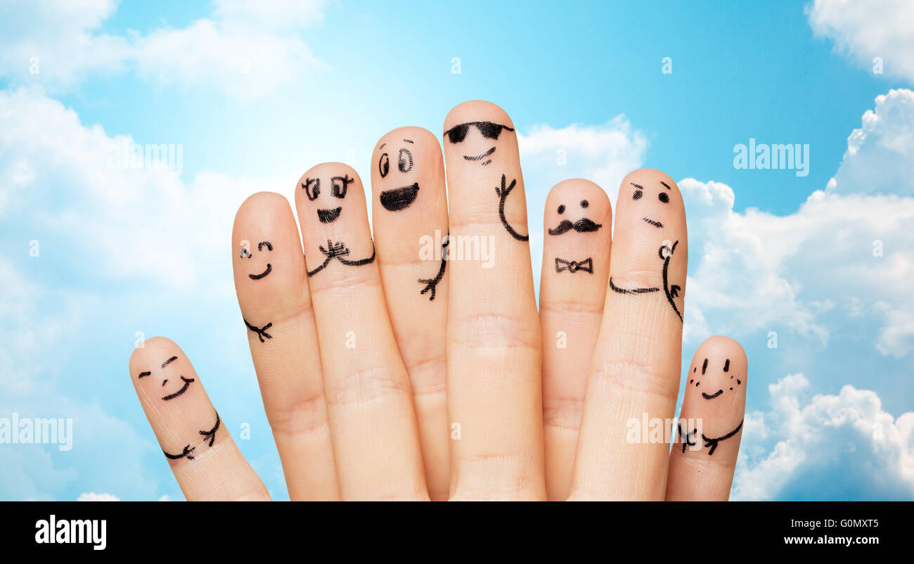 close up of hands and fingers with smiley faces Stock Photo - Alamy