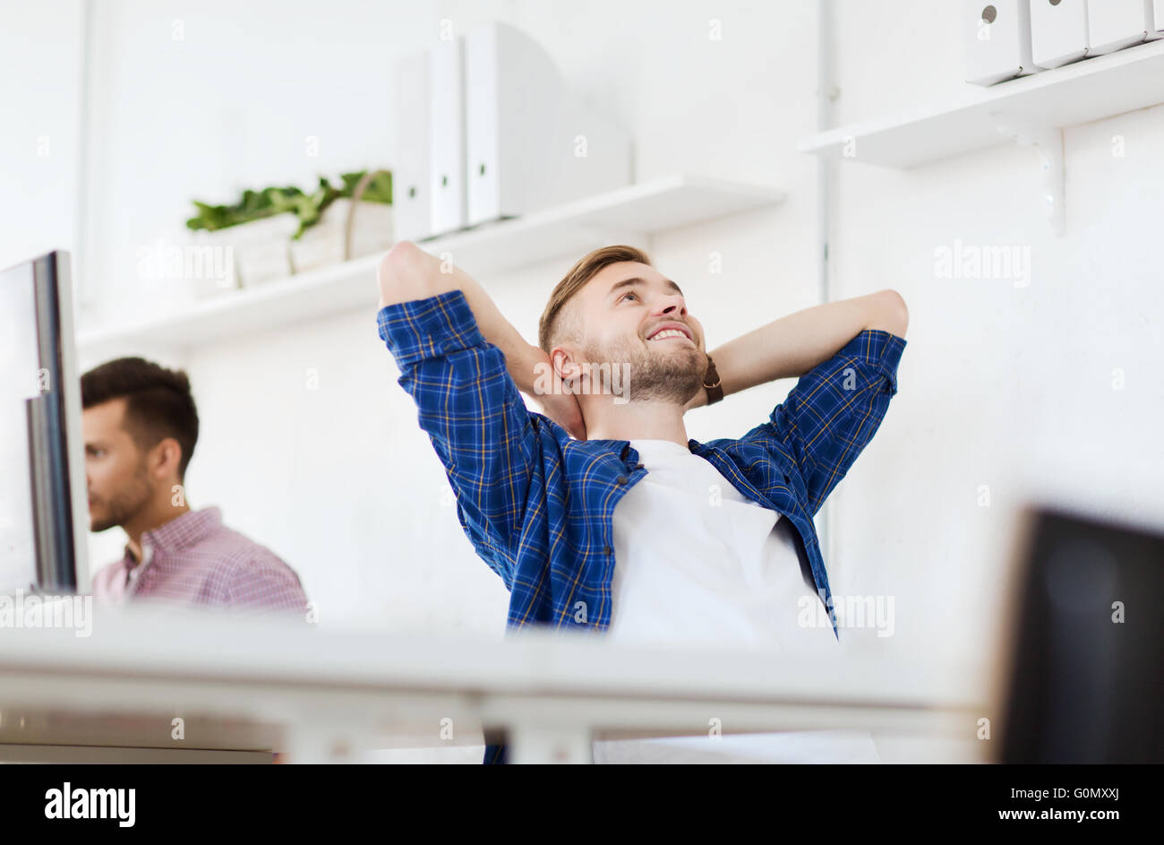 happy creative man with computer at office Stock Photo - Alamy