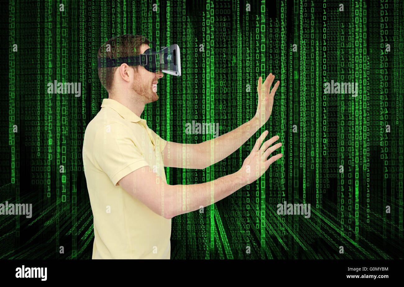 happy man in virtual reality headset or 3d glasses Stock Photo - Alamy
