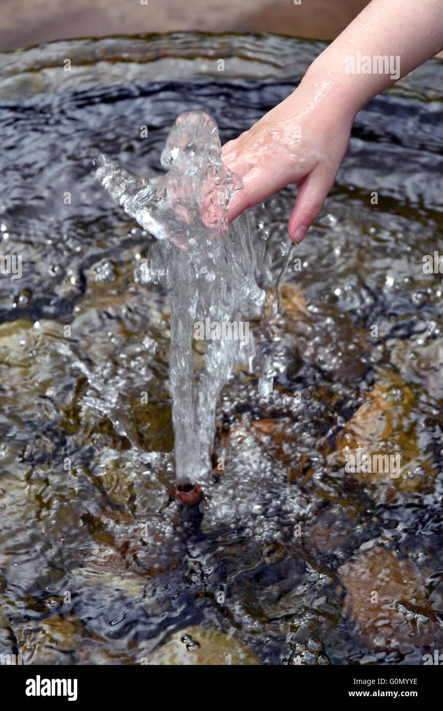Child touching water hi-res stock photography and images - Alamy