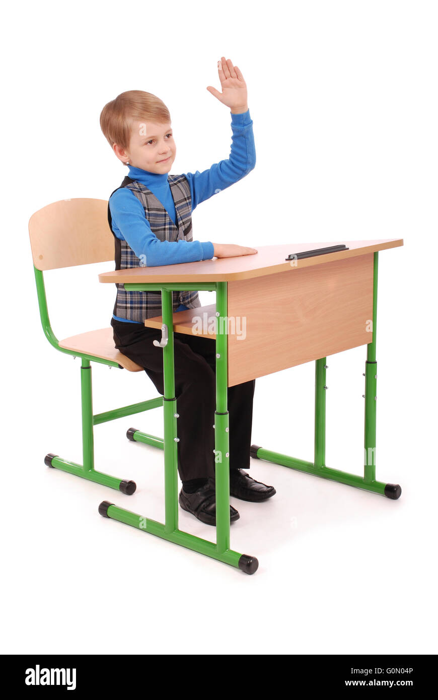 Boy raising hand to ask question isolated on white Stock Photo - Alamy