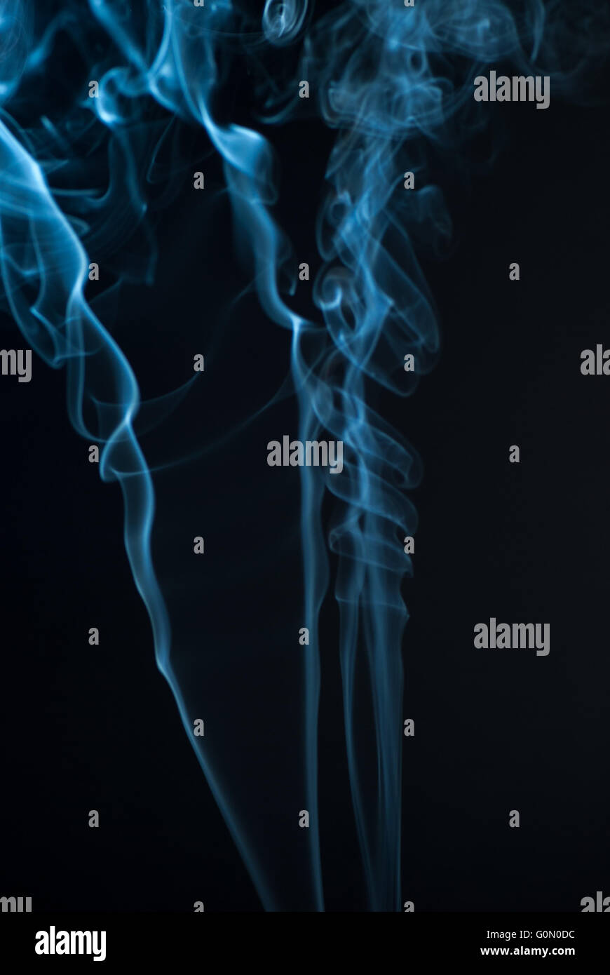 Beautiful smoke on the black background - macro photo Stock Photo - Alamy