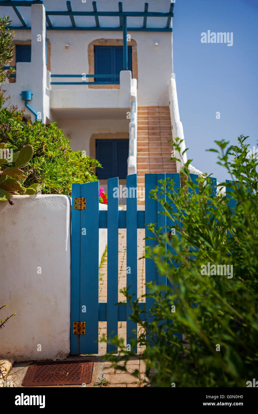 House blue white gate hi-res stock photography and images - Alamy