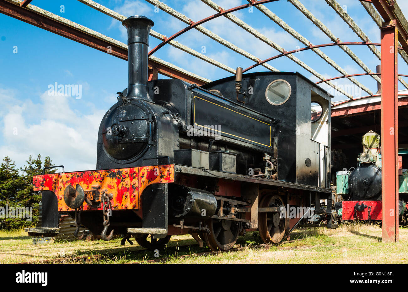 Ene small black steam engine out in the sunshine Stock Photo - Alamy
