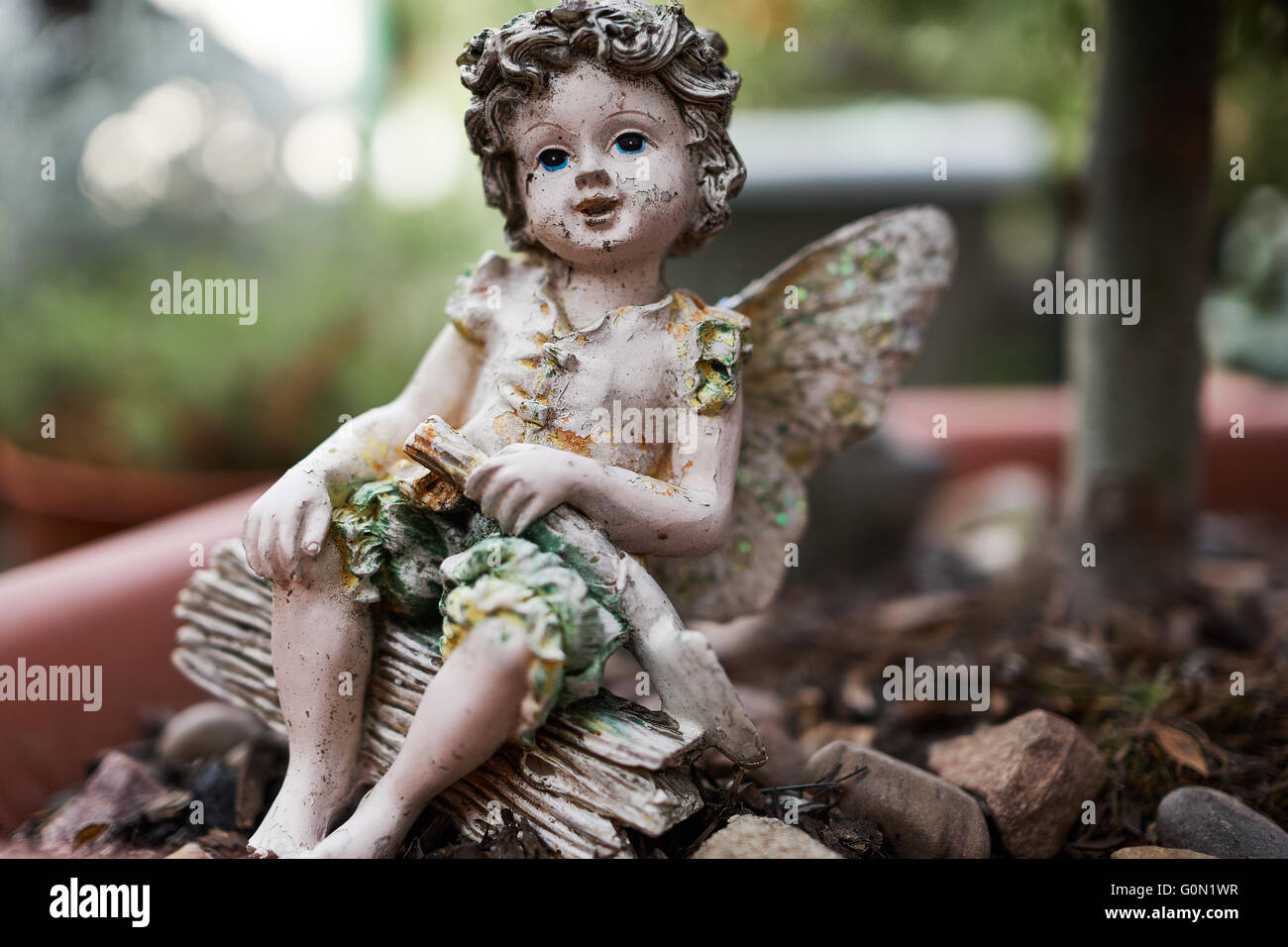 Faded Fairy decorative garden ornament Stock Photo - Alamy