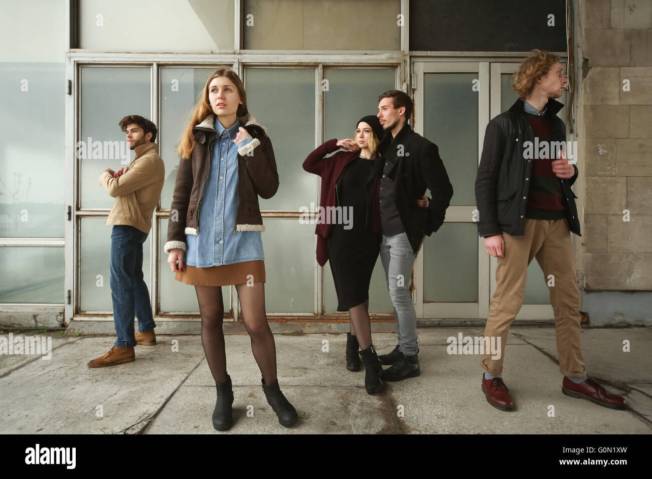 a group of serious young men standing together Stock Photo - Alamy