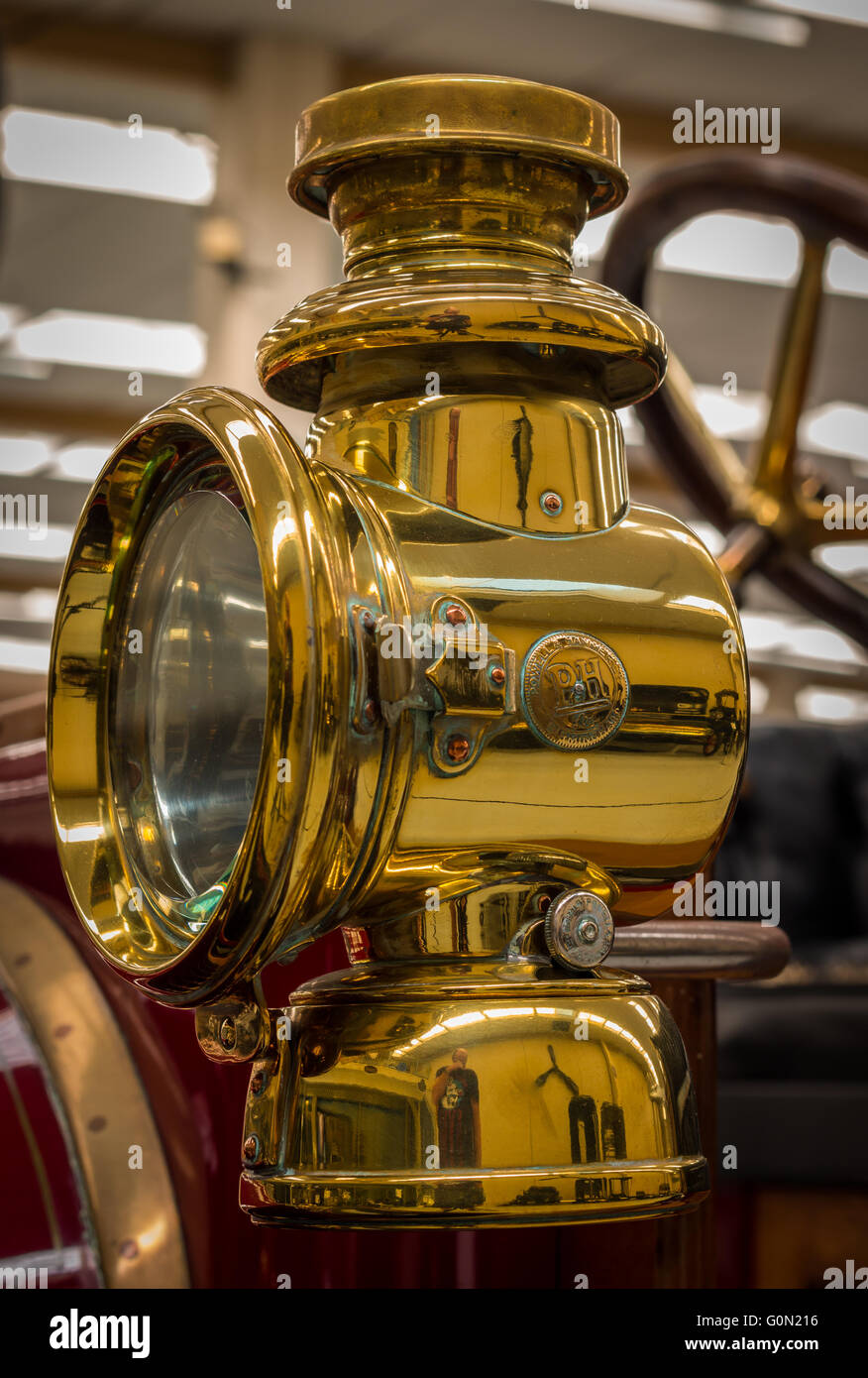 One very shiny brass vintage side light Stock Photo - Alamy