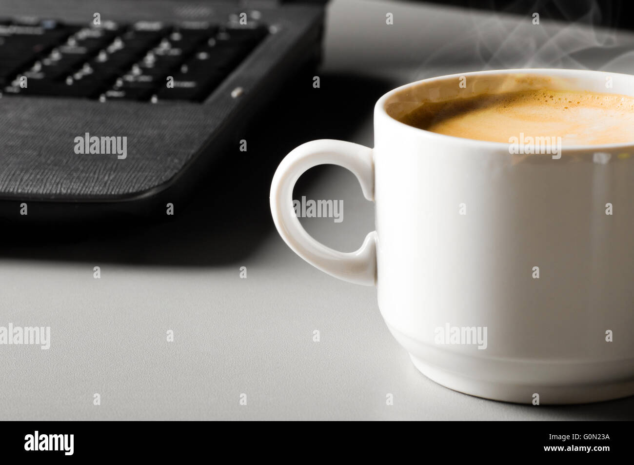 laptop with cup of coffee Stock Photo - Alamy