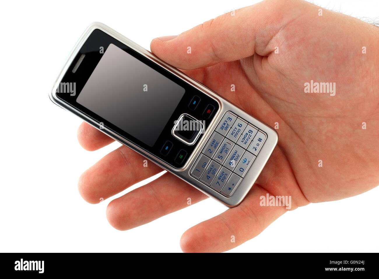 Male hand holding mobile phone. The screen is cut with clipping path ...