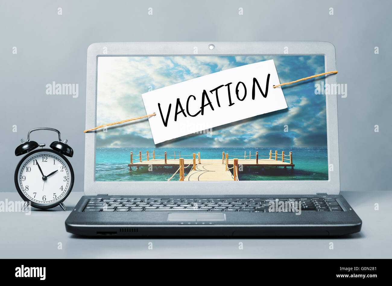 laptop with vacation note Stock Photo - Alamy