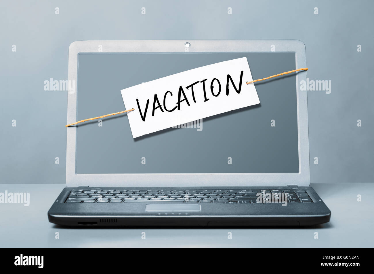 laptop with vacation note Stock Photo - Alamy