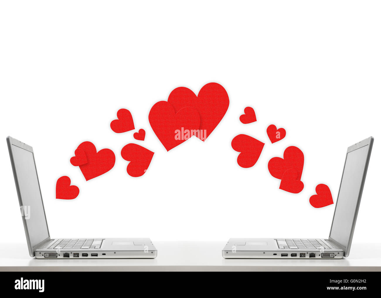 two laptops with hearts Stock Photo - Alamy