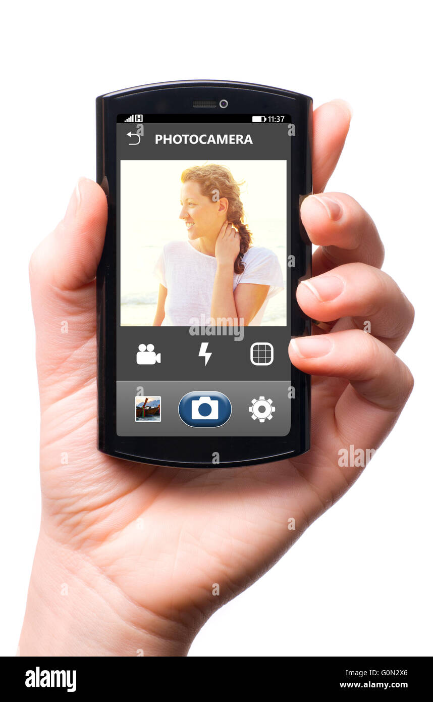 Hand holding phone to camera Cut Out Stock Images & Pictures - Alamy