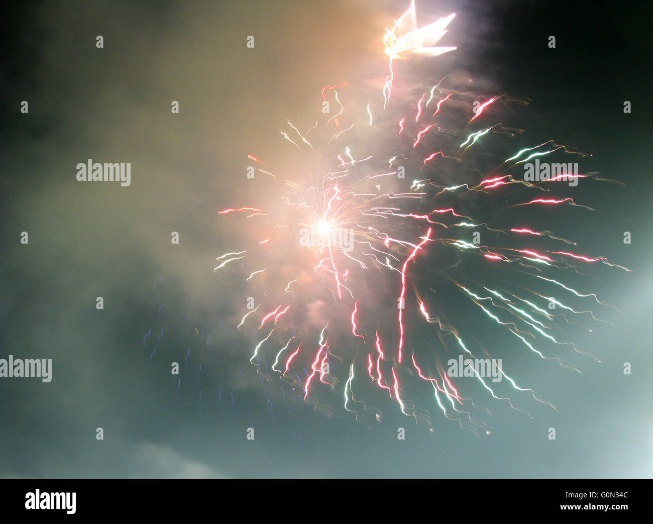 Abstract firework patterns in the night sky Stock Photo - Alamy