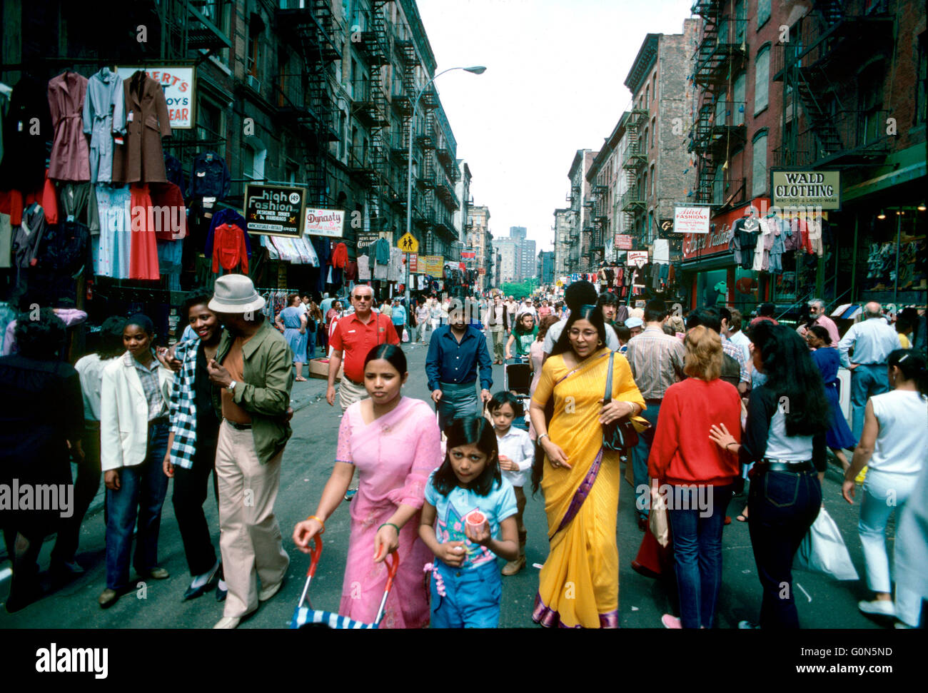 New York, Manhattan, multiracial citizens walking down Orchard Street ...