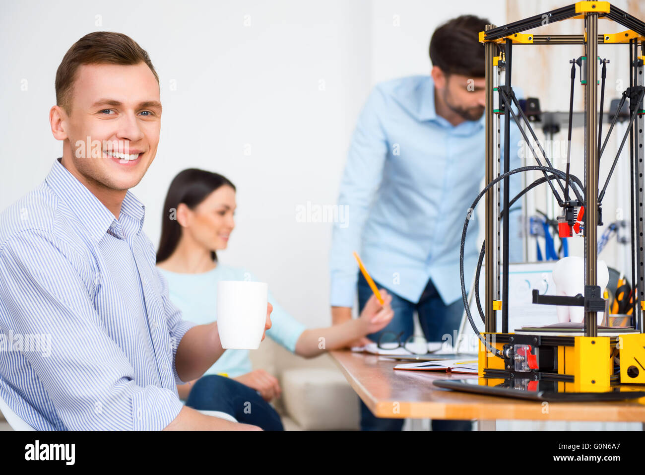 Positive students using 3d printer Stock Photo - Alamy