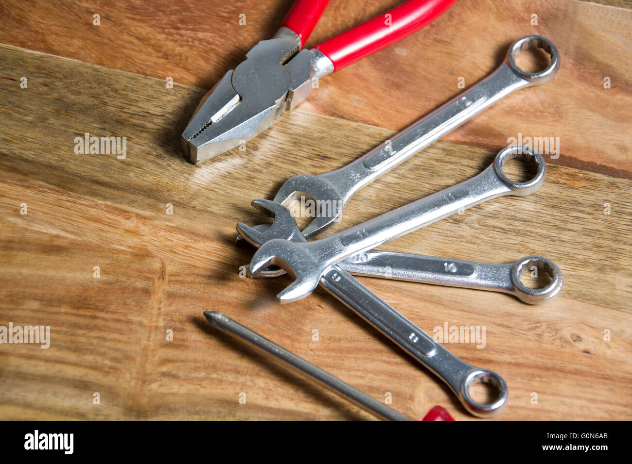 tool on wooden background Stock Photo - Alamy