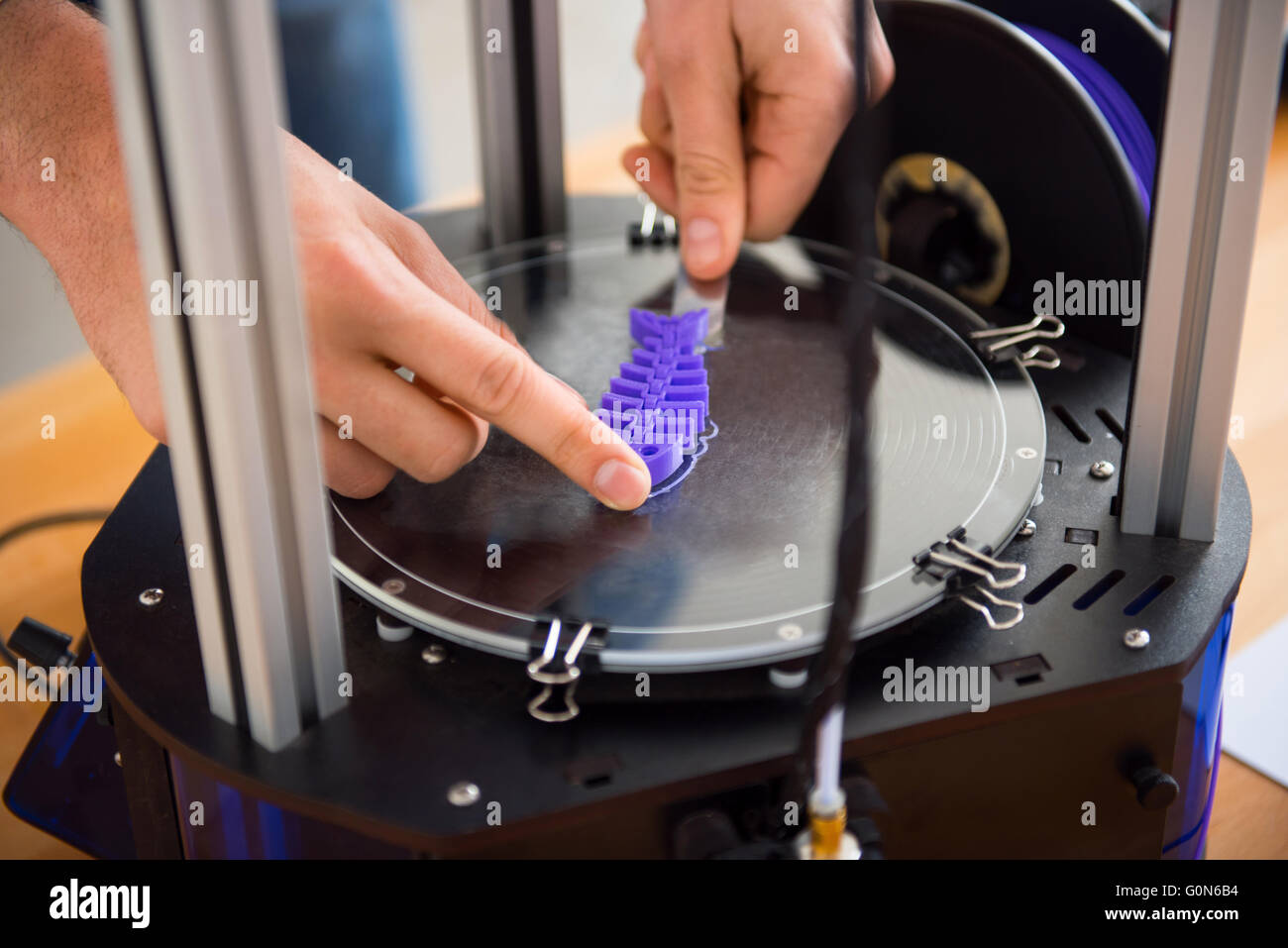 Pleasant person using 3d printer Stock Photo - Alamy