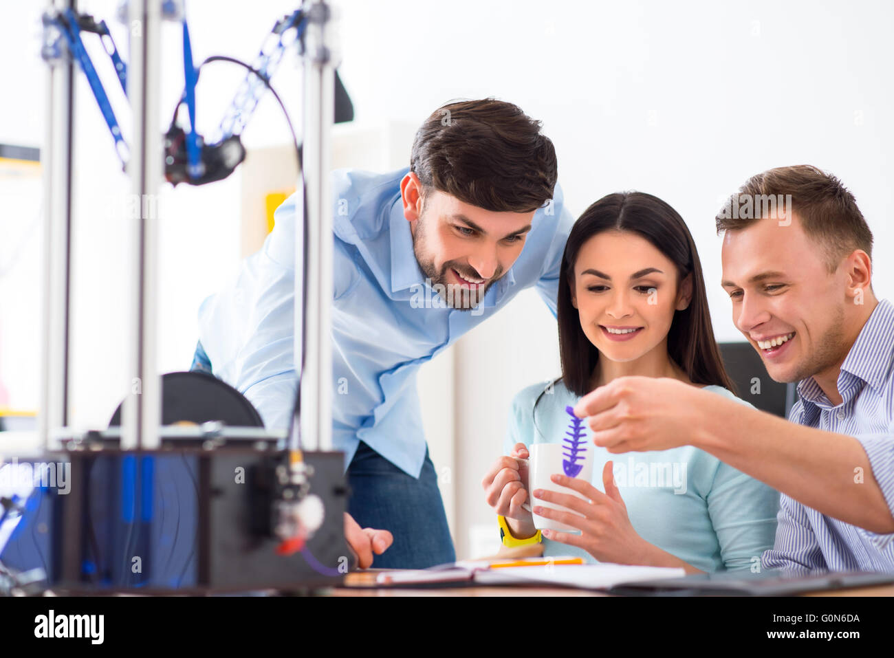Positive students using 3d printer Stock Photo - Alamy