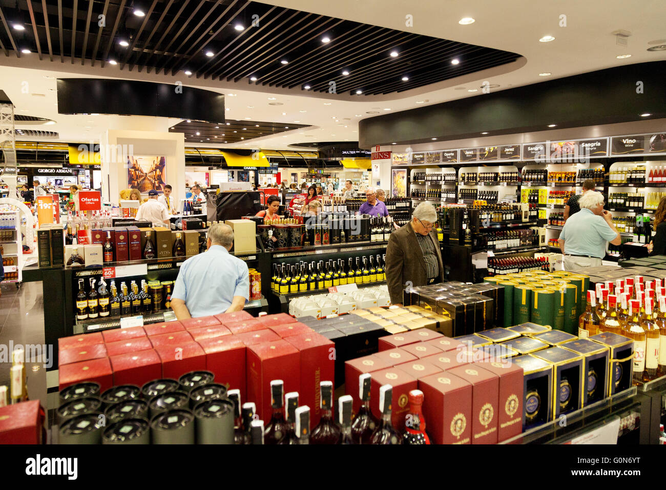 People shopping for duty free alcohol in the Duty Free shop, Marbella ...