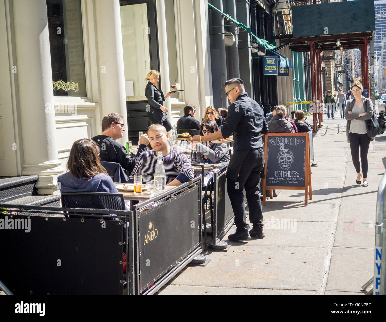 Sidewalk cafe of a bar/restaurant in the Tribeca neighborhood of New ...