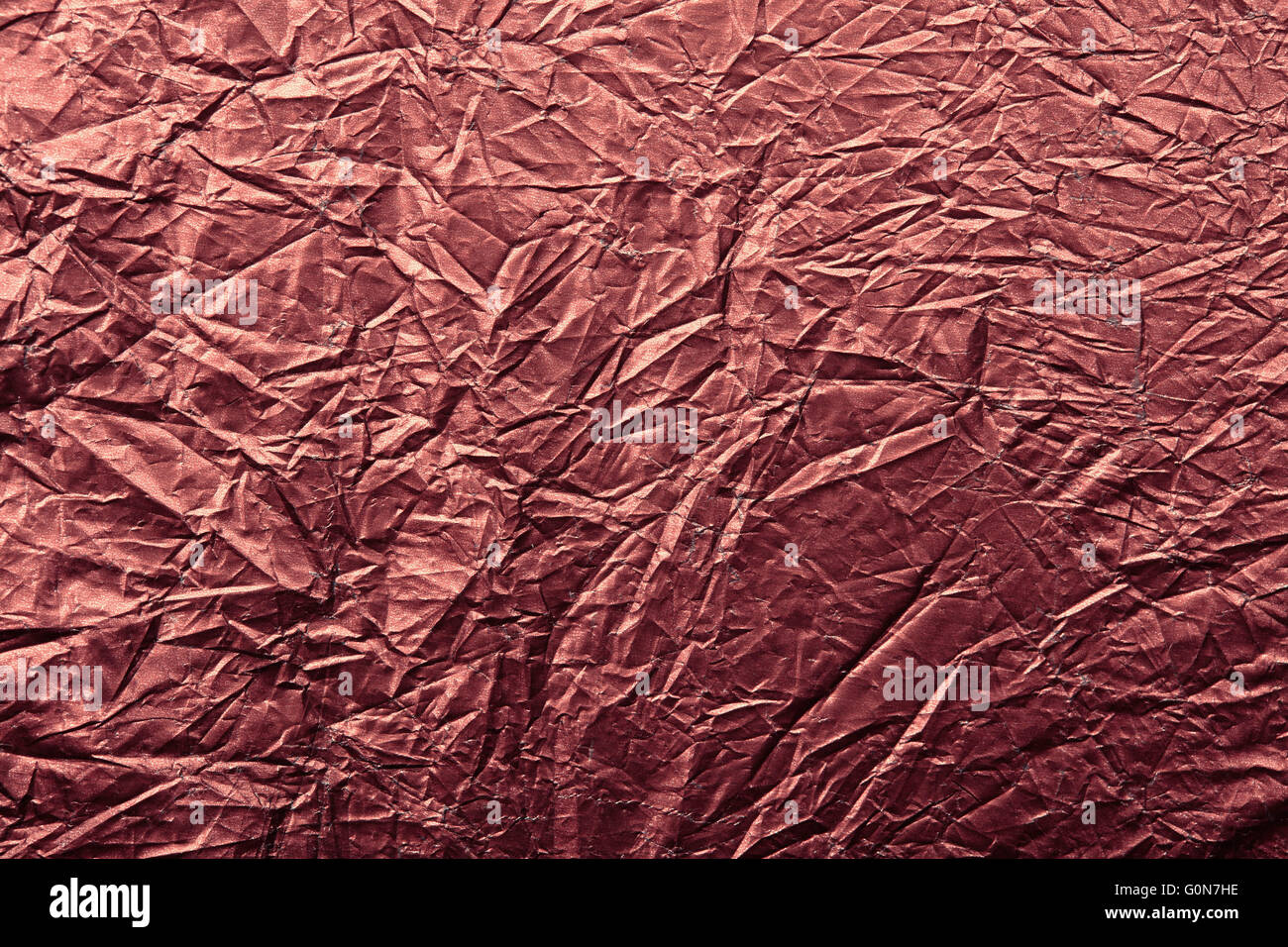 red crumpled paper texture macro Stock Photo - Alamy