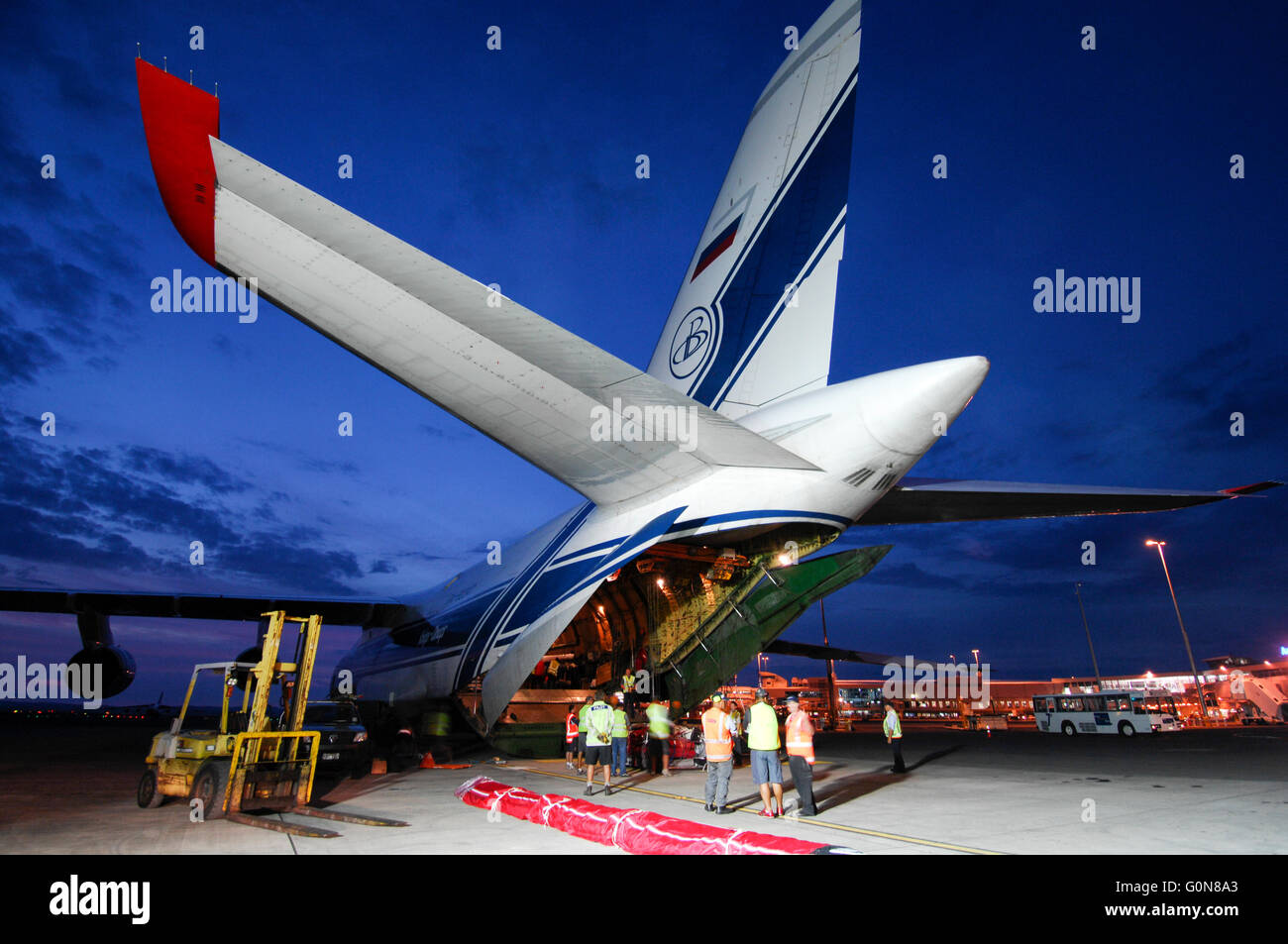 Rear cargo bay doors open for loading. Volga-Dnepr Airlines, Antonov An ...