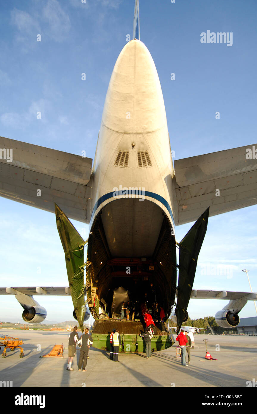 Rear cargo doors open for unloading at Valencia Airport, Spain. Volga ...
