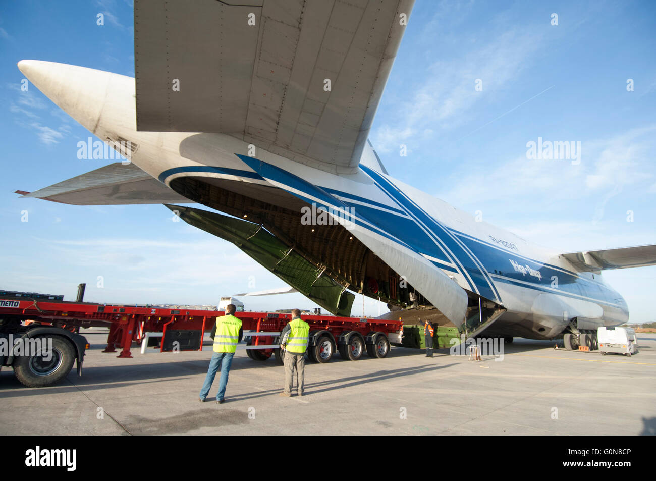 Rear cargo doors open for unloading at Valencia Airport, Spain. Volga ...