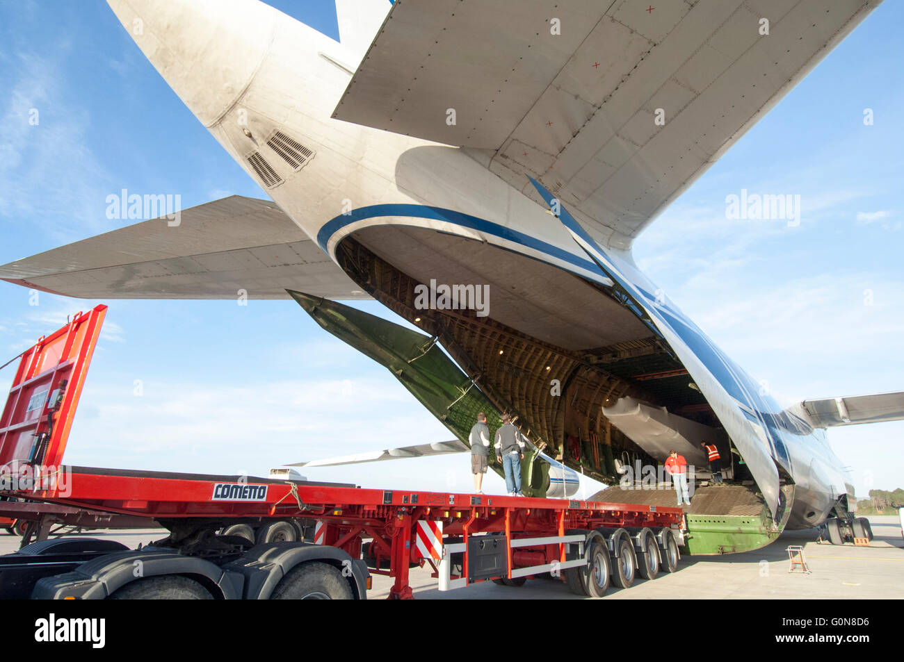 Rear cargo doors open for unloading at Valencia Airport, Spain. Volga ...