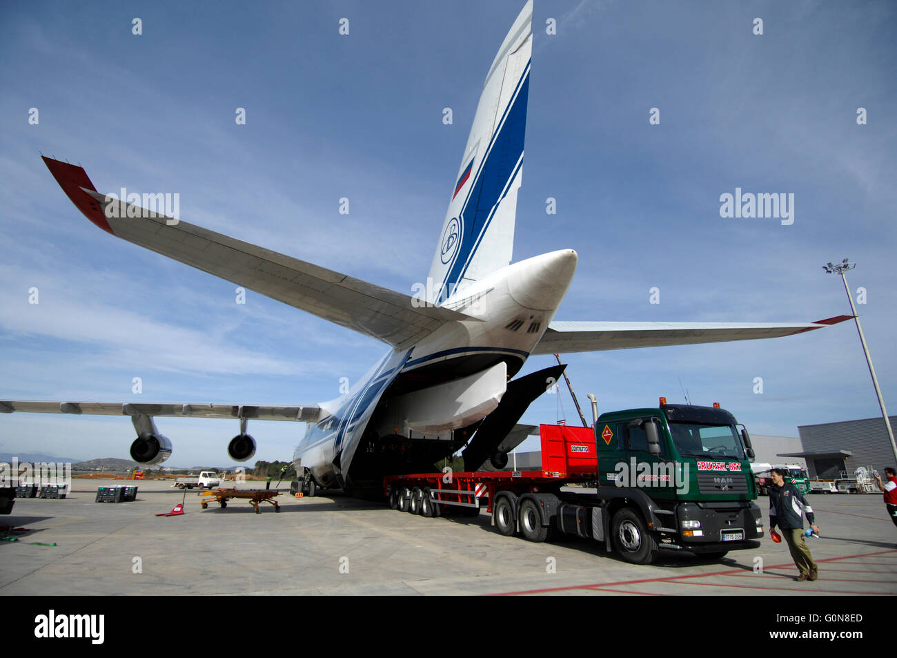 Rear cargo doors open for unloading at Valencia Airport, Spain. Volga ...