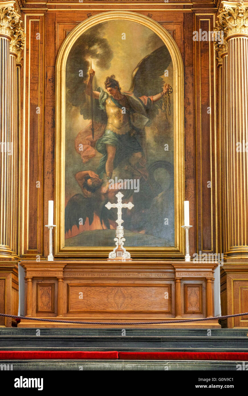 Painting of the Angel Michael defeating the Devil behind the altar in ...
