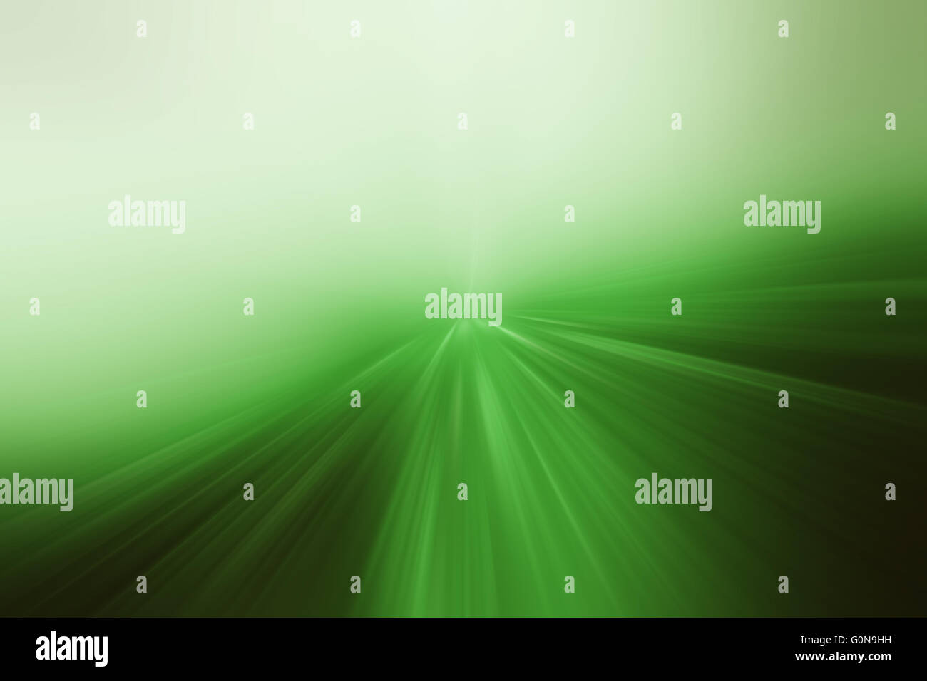 Bright white flash on a green and black background Stock Photo - Alamy