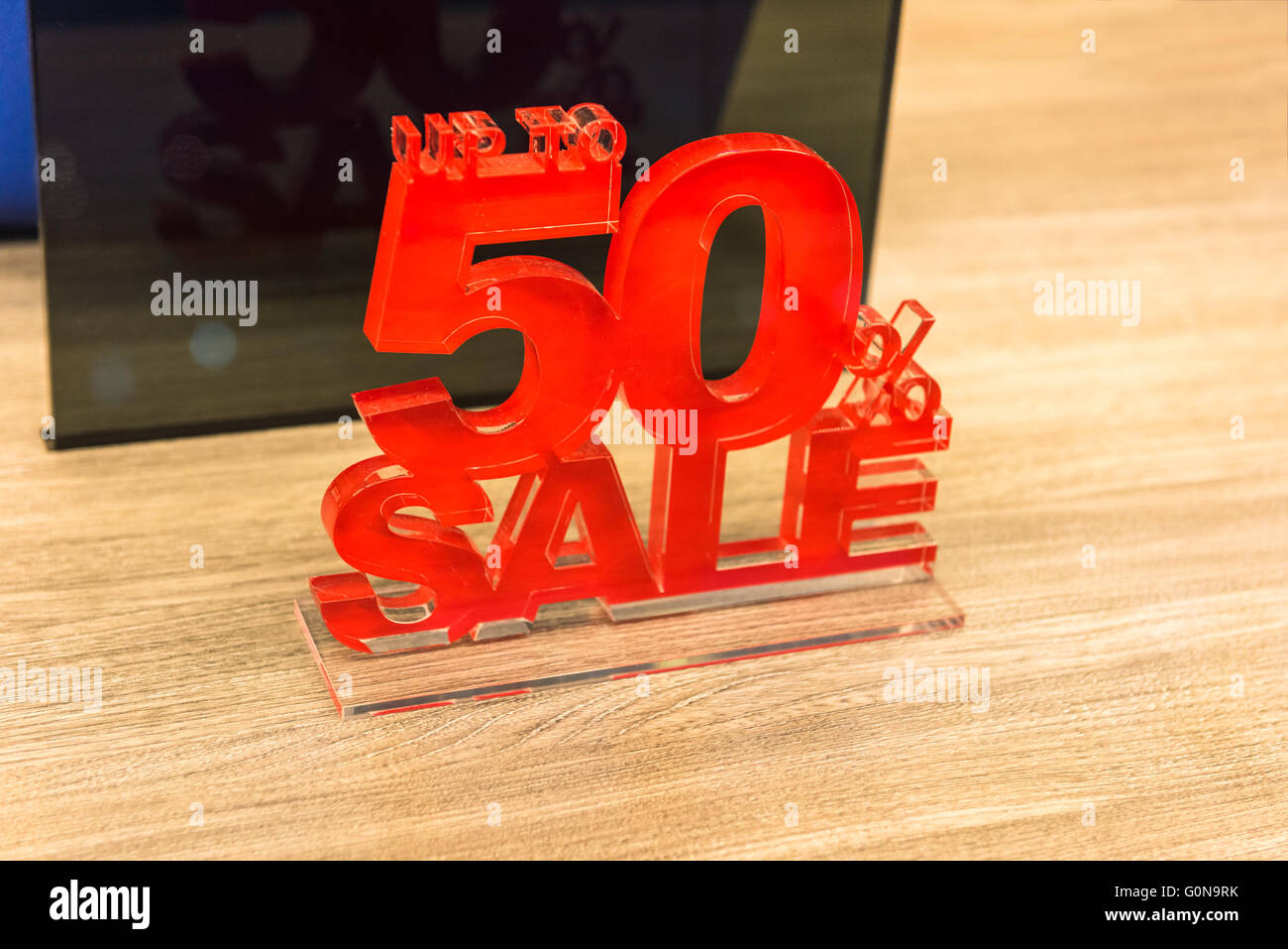 Sale sign in department store window hi-res stock photography and ...